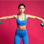 How to Do Dumbbell Lateral Raises (With 7 Variations) - Gym Geek